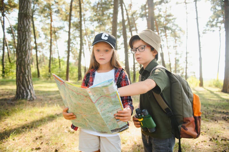 Kids scouts in the forest. stock image. Image of travel - 255418201