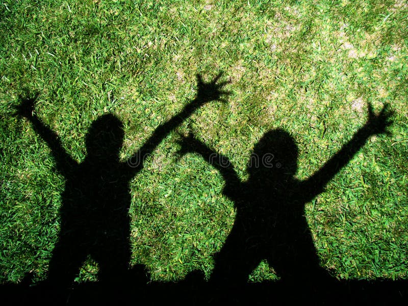 Kids shadows stock photo. Image of green, kids, backyard - 5677622