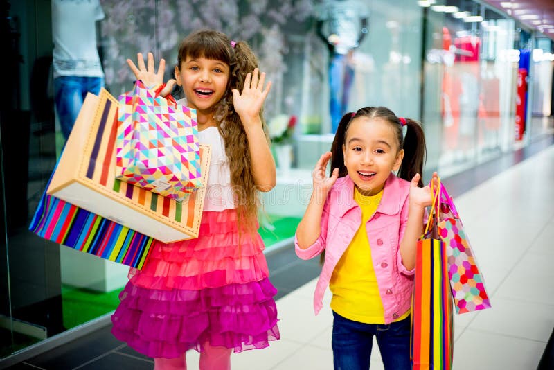 Kids shopping in mall stock photo. Image of childhood - 93740814
