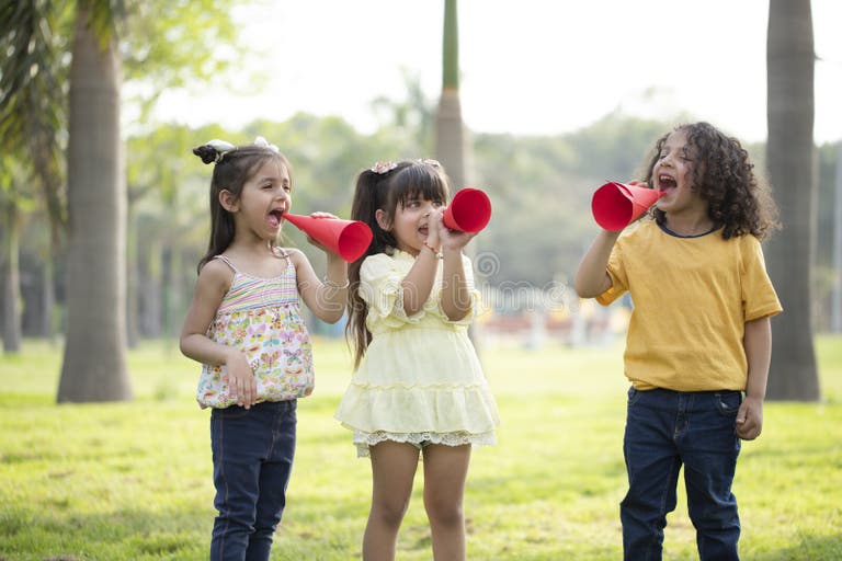 Kids Shouting into Paper Megaphone Stock Image - Image of megaphone ...