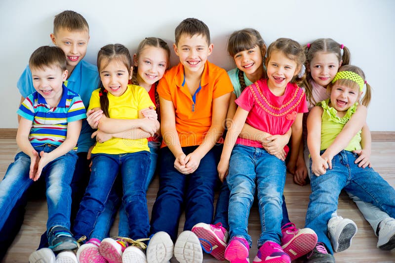 Kids sit together stock photo. Image of young, teacher - 89579748