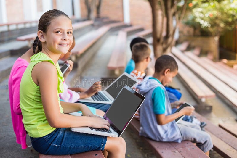 Kids Sitting on Bench and Using Laptop Stock Photo - Image of friend ...