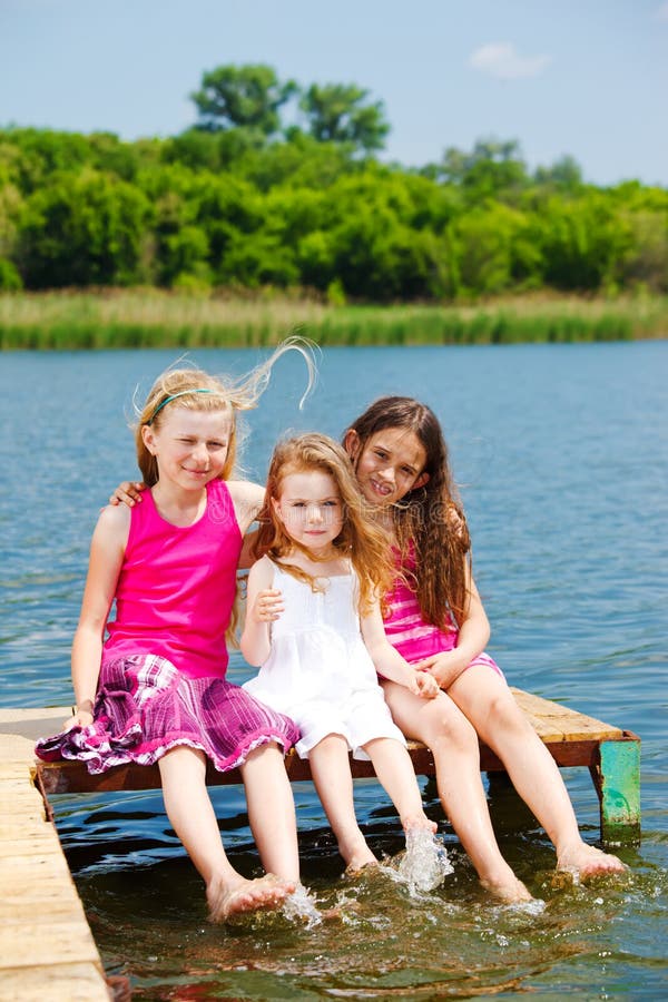 Kids sitting on bridge stock image. Image of people, preschool - 19932015