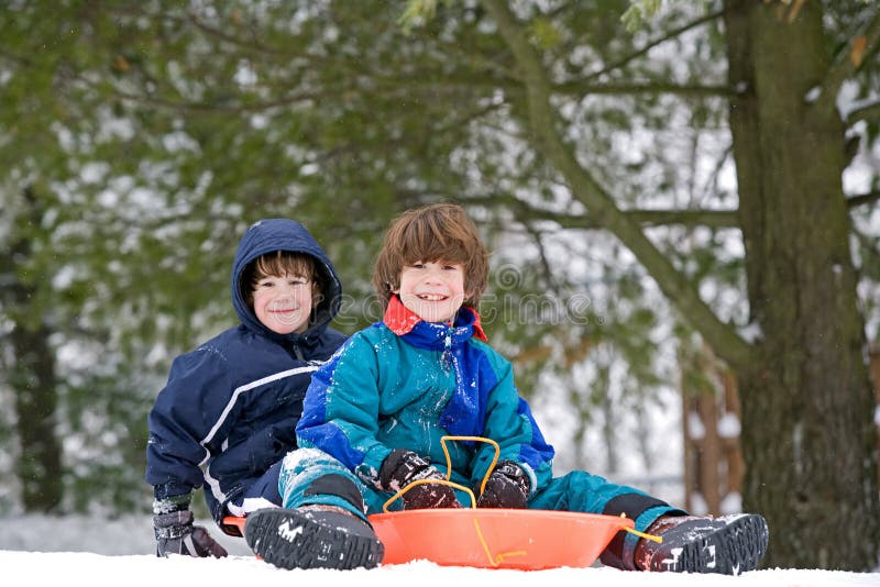 Boys Sledding stock photo. Image of happy, extreme, families - 1978444