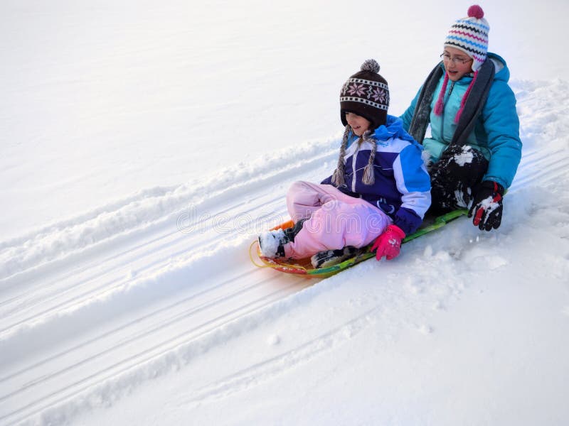 Kids Sledding Down Snow Hill on Sled Fast Speed Stock Image - Image of ...