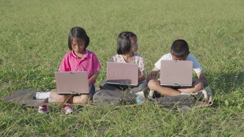 Happy Kids Smiling and Learning on Grass Field Stock Footage - Video of ...