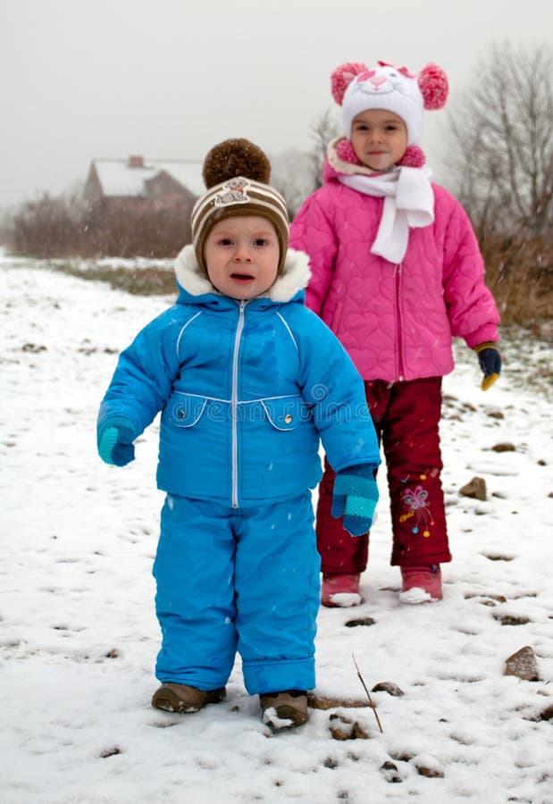 Group Of Children Playing On Snow In Winter Time Stock Image - Image of ...