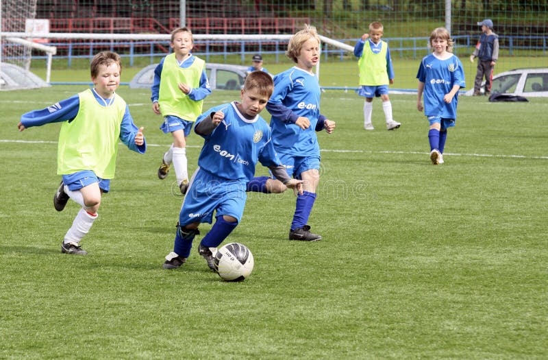Kids playing football stock image. Image of running, match - 29318311