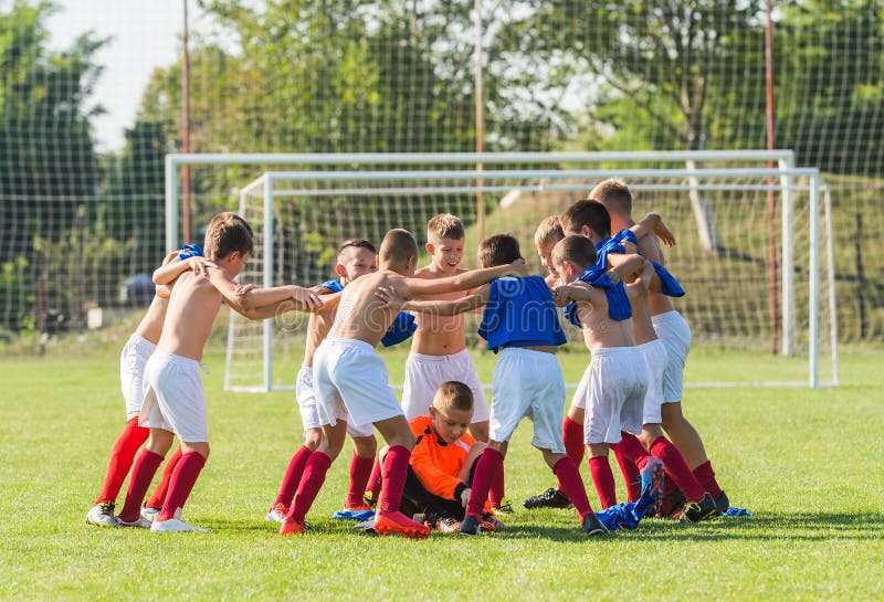 Soccer Team Standing In A Huddle Stock Image - Image of five, sharing ...
