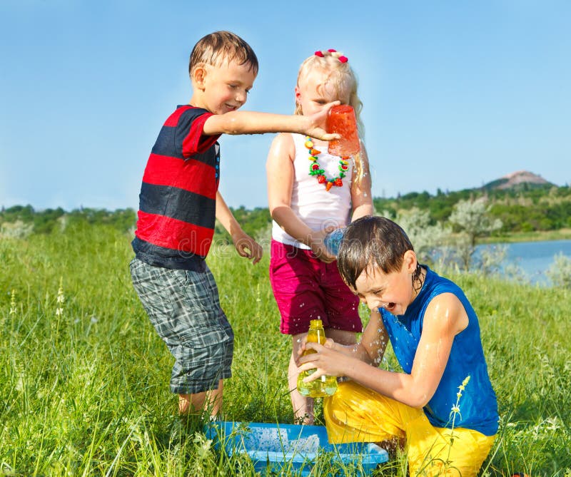 Kids splashing water stock image. Image of group, container - 29487285