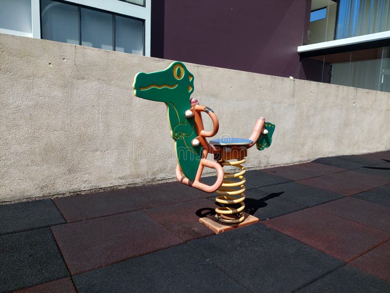 Kids Spring Toy with Dinosaur Shape Stock Photo - Image of monument ...