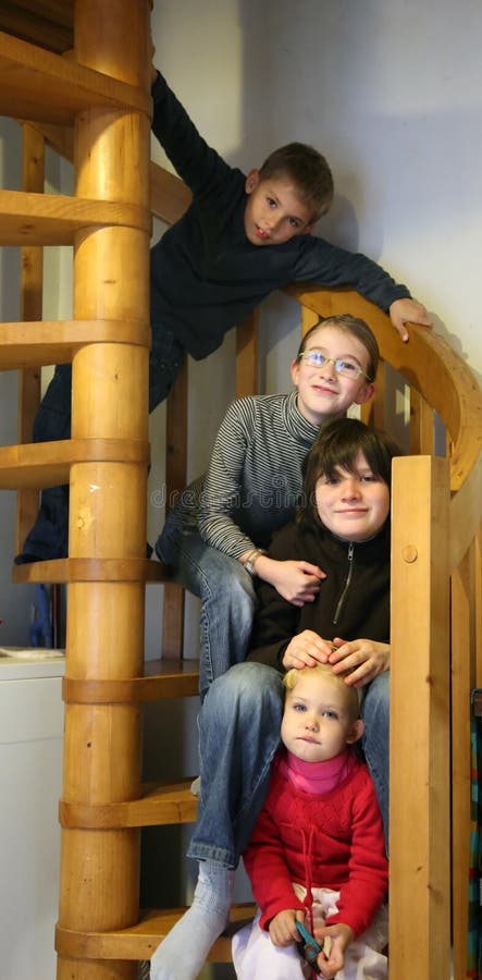 Kids in staircase stock image. Image of round, group - 13396083