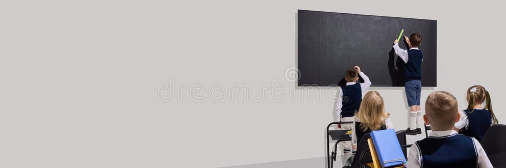Kids Standing at Blackboard, Solving Problem Using Ruler while ...