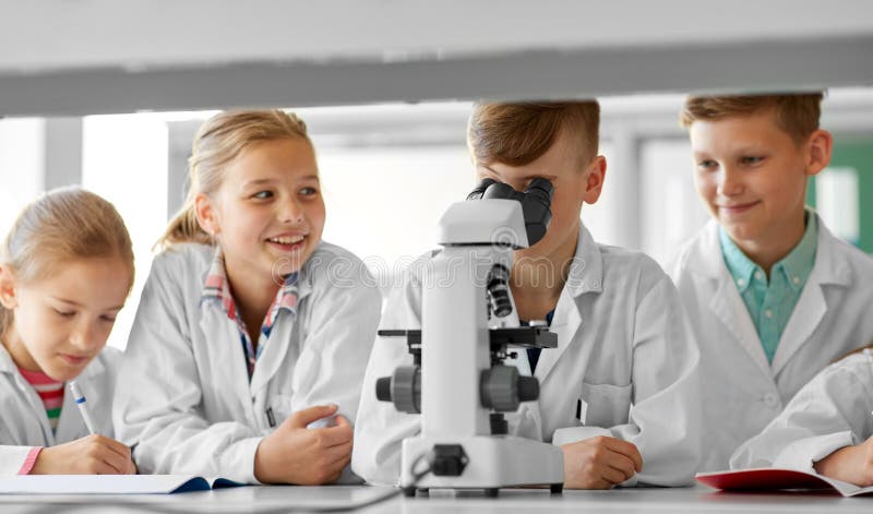 Kids or Students with Microscope Biology at School Stock Image - Image ...