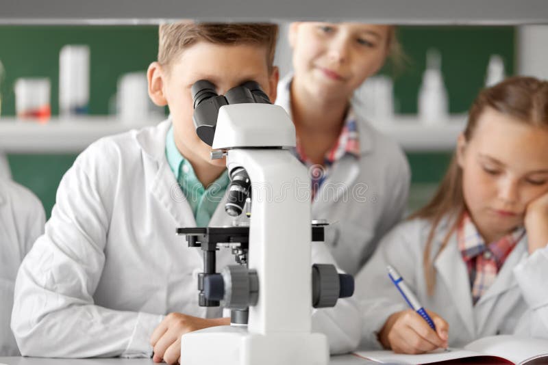 Kids or Students with Microscope Biology at School Stock Image - Image ...