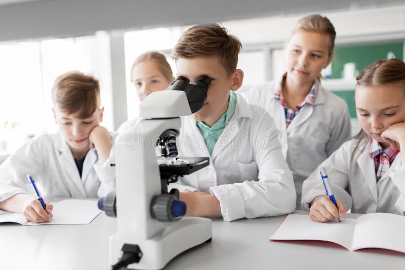Kids or Students with Microscope Biology at School Stock Photo - Image ...