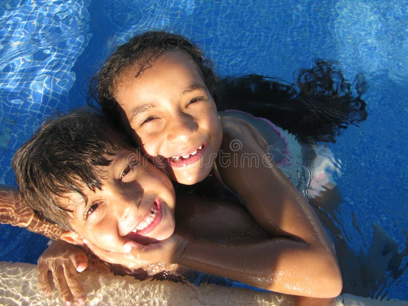 Kids in swimming pool stock photo. Image of kids, hotel - 25883126
