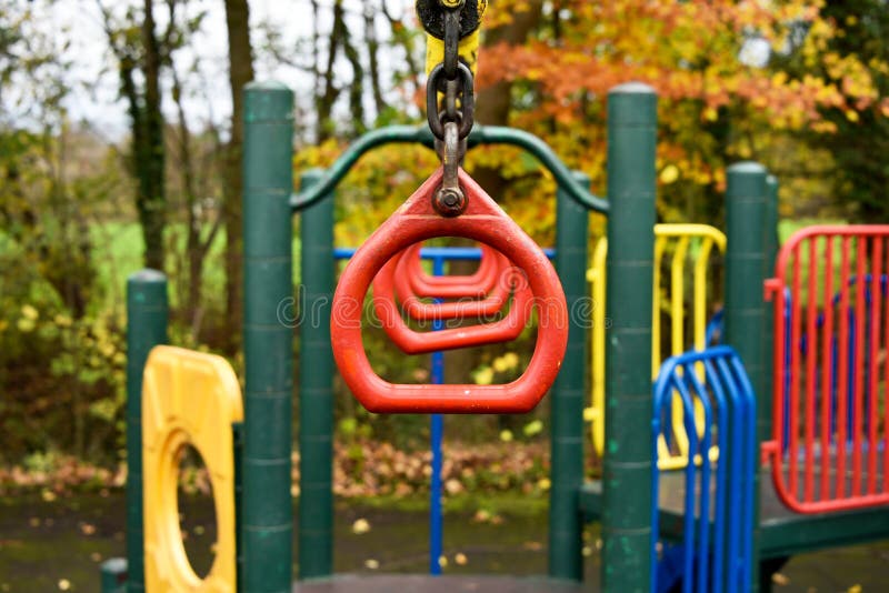 Kids swinging Monkey bars stock image. Image of little - 62154149