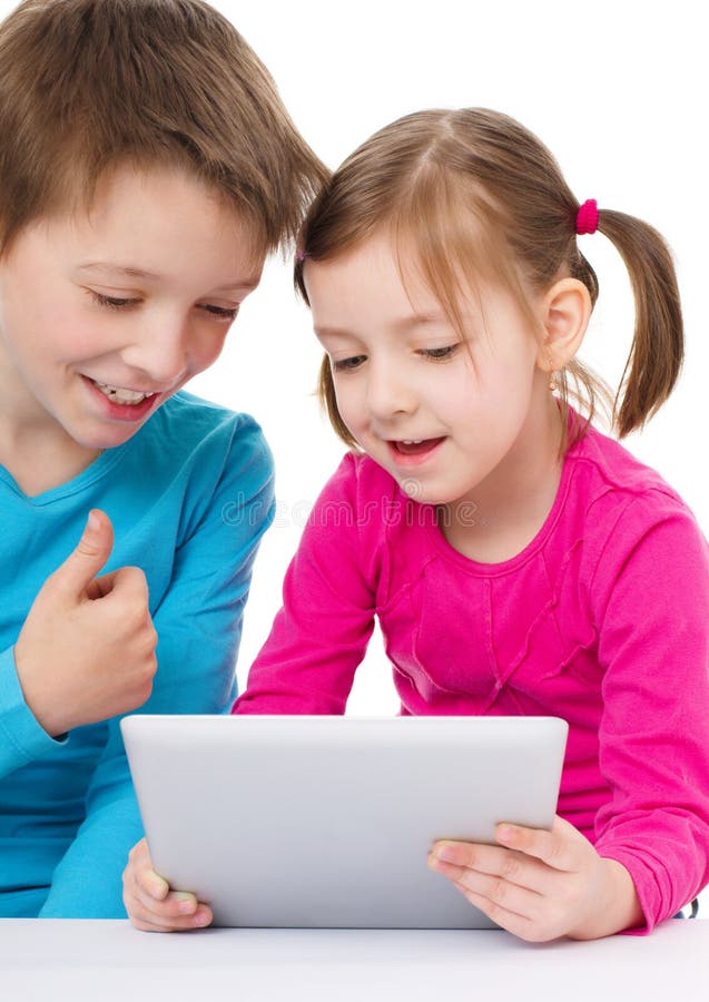 Kids with tablet stock photo. Image of holding, friends - 40270620