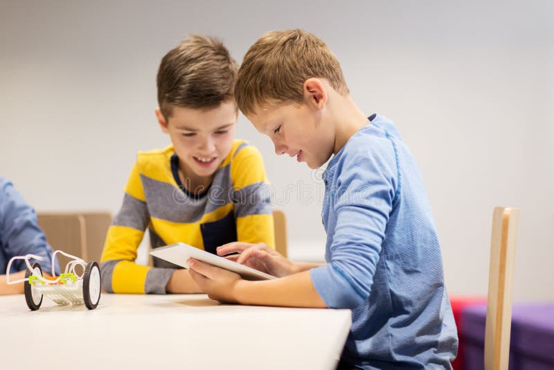 Kids with Tablet Pc Programming at Robotics School Stock Image - Image ...
