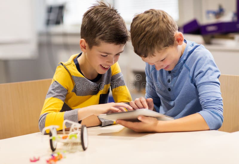 Kids with Tablet Pc Programming at Robotics School Stock Photo - Image ...
