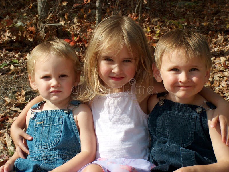 Kids three siblings stock image. Image of girl, smile - 2445809