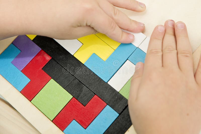 Wooden Puzzle. Intelligent, Brain Training Game. Stock Photo - Image of ...