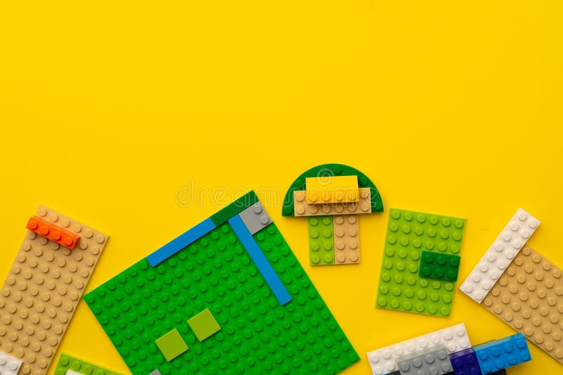 Kids Toy Constructor Details Scattered on Yellow Background Stock Image ...