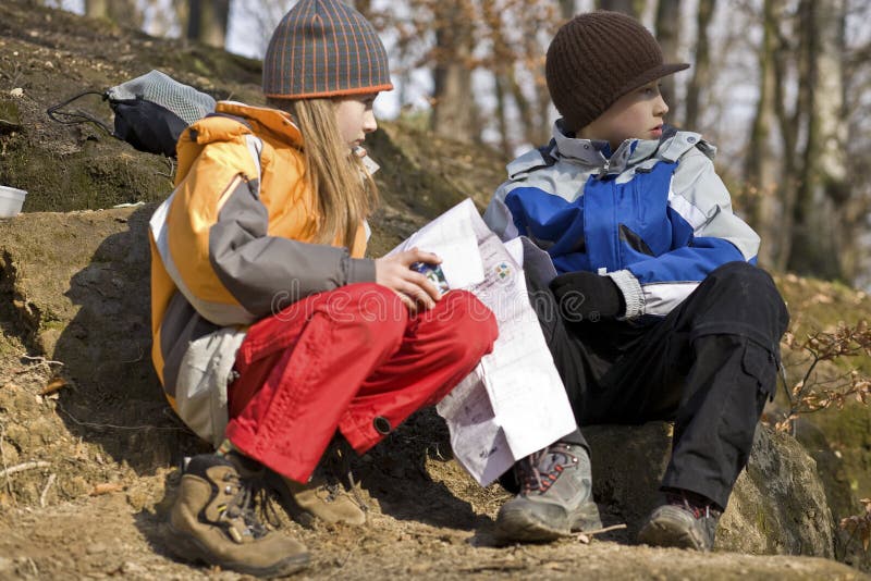 Kids With Map On Treasure Hunt Navigation Activity Stock Image - Image ...