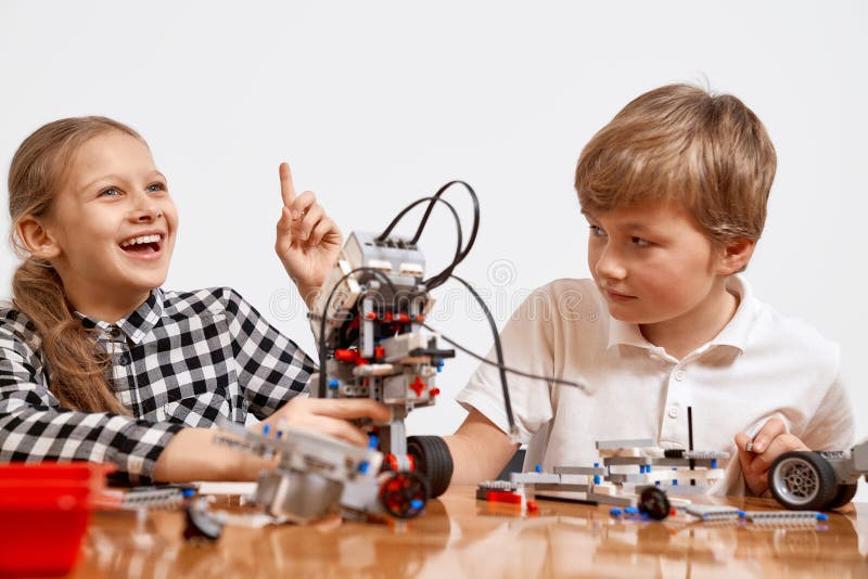 Kids using building kit. stock photo. Image of innovation - 181997100