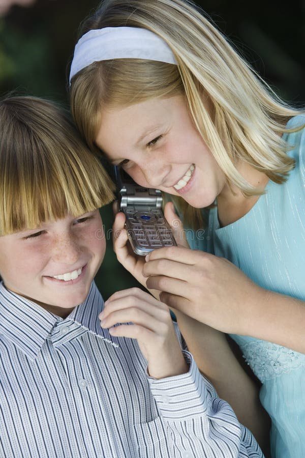 Kids Using Cellphone Together Stock Image - Image of holding, phone ...