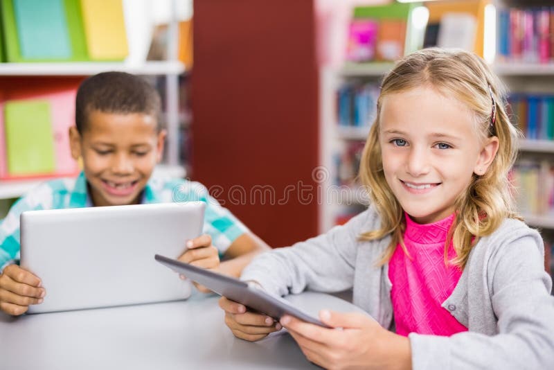 Kids Using Digital Tablet in Library Stock Image - Image of indoors ...