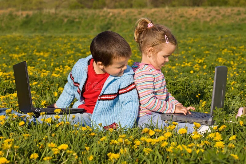 Kids using laptops stock photo. Image of grass, outside - 9509050