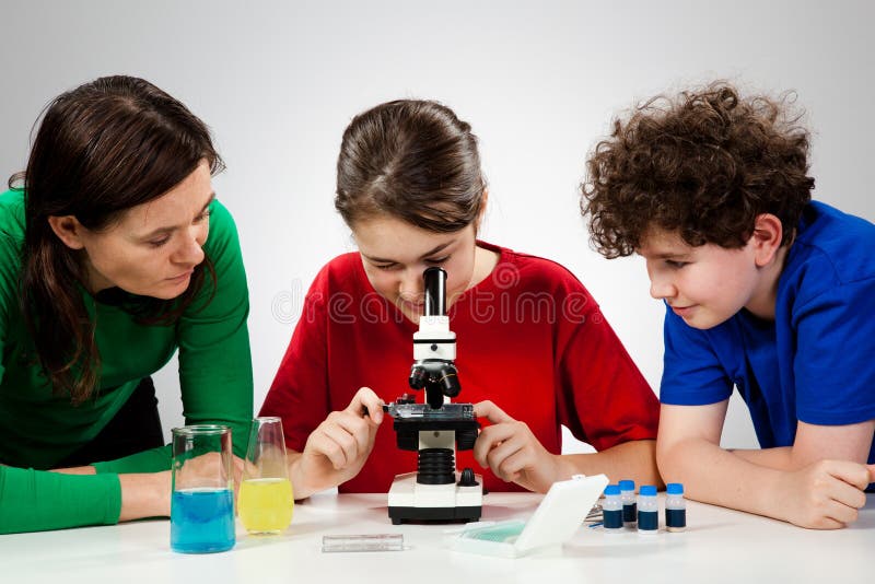 Kids using microscope stock image. Image of home, bacteria - 20263599