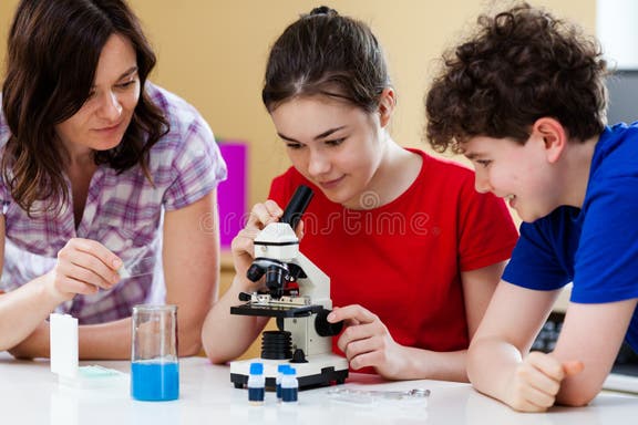 Kids using microscope stock photo. Image of look, discovery - 36653082