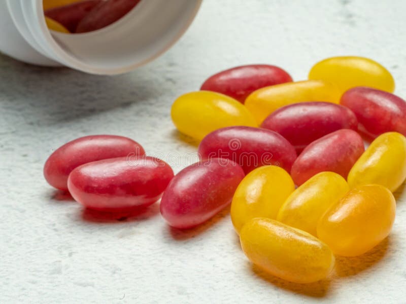 Kids Vitamins Tablets in Yellow and Red, Close Up Stock Image - Image ...