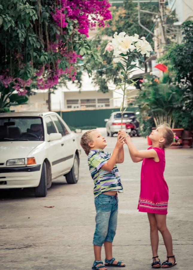 Kids walking by the street stock image. Image of game - 193842575