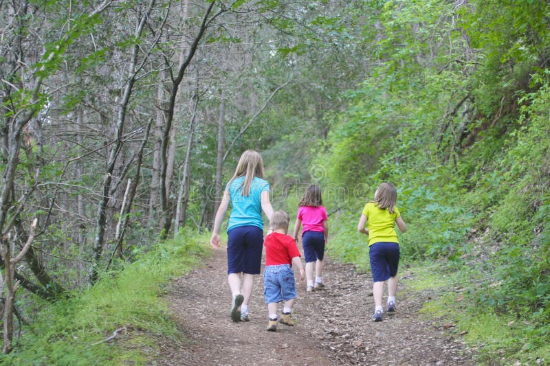 Kids walking on the trail stock image. Image of natural - 14254019