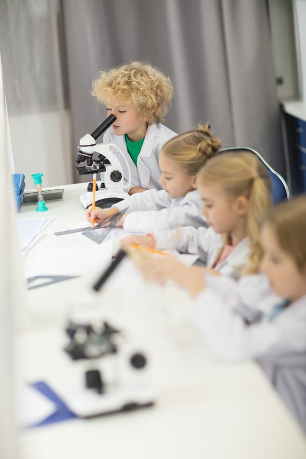 Kids Wearing Lab Coats and Studying in Science Laboratory Stock Photo ...