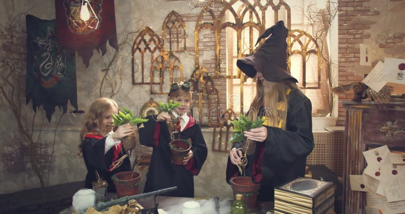 Magic School Student is Holding a Mandragora Root in Botany Class ...