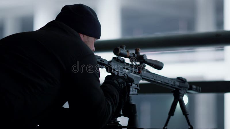 Killer with Assault Rifle at Position. Hitman Using Rifle with ...