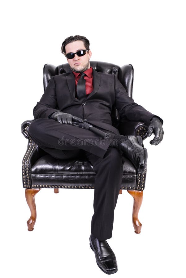 Killer sitting on chair stock image. Image of professional - 81616401