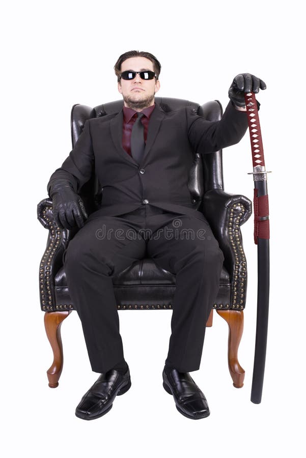 Killer sitting on chair stock image. Image of professional - 81616401