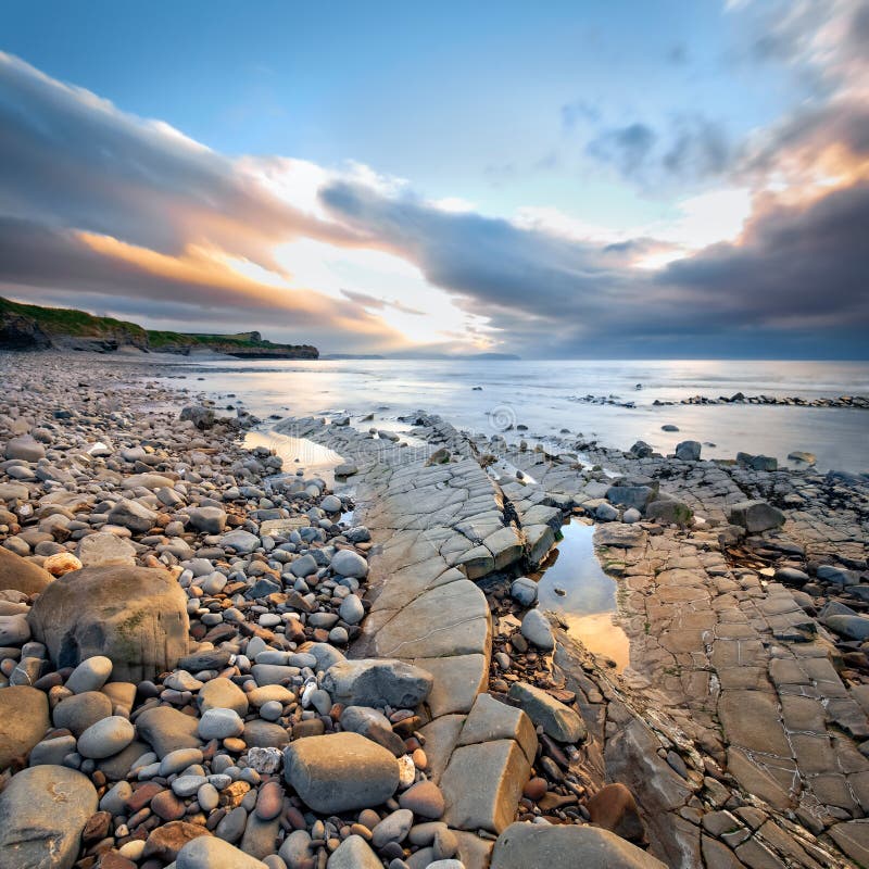 Kilve beach at sunset stock image. Image of shoreline - 94311279