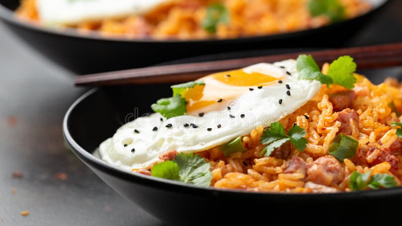 Kimchi Fried Rice with Fried Egg and Bacon. Korean Food Stock Photo ...