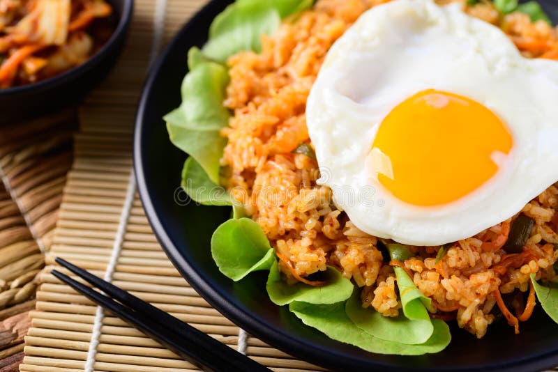 Korean Food, Kimchi Fried Rice with Fried Egg Stock Image - Image of ...
