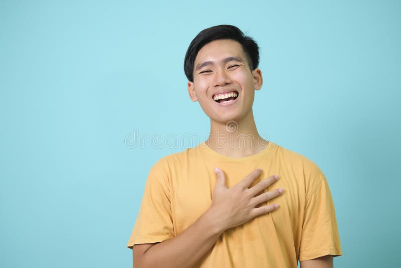 Kind Hearted Friendly Looking Young Man Keep Palms on Chest Stock Image ...