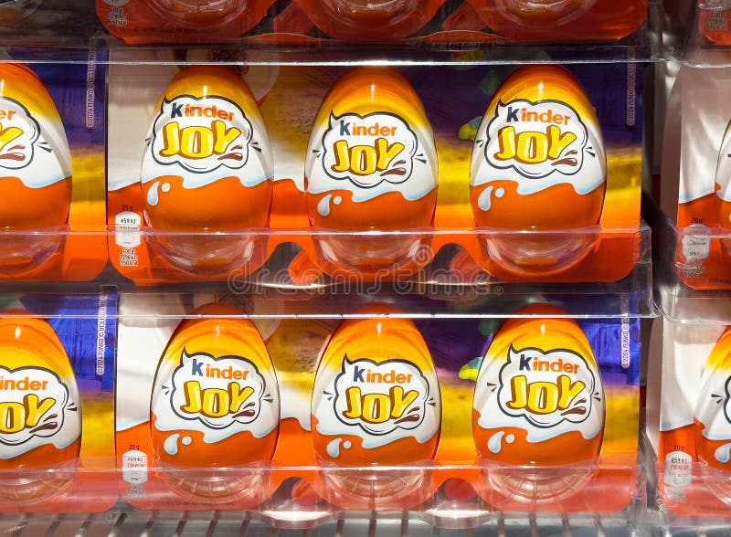 Kinder Joy Chocolate Eggs in Orange and White Packaging on Display ...