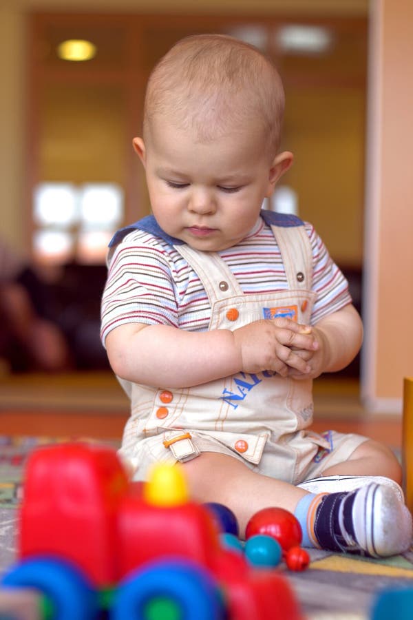 In the kindergarten stock image. Image of parent, infant - 941995