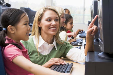 Kindergarten Children Learn To Use Computers Stock Photo - Image of ...